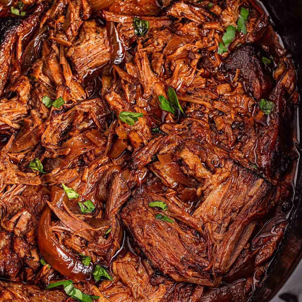 Crock pot pulled brisket - Deliciously Home Cooked